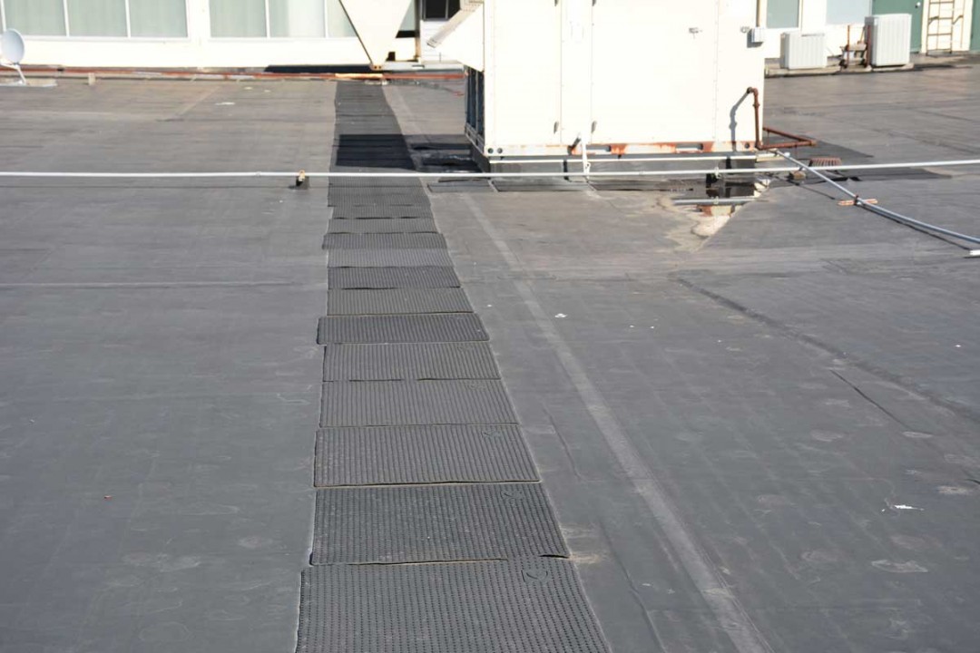 Protective-walk-matts-on-a-EPDM-roof - Commercial Roofing Contractors